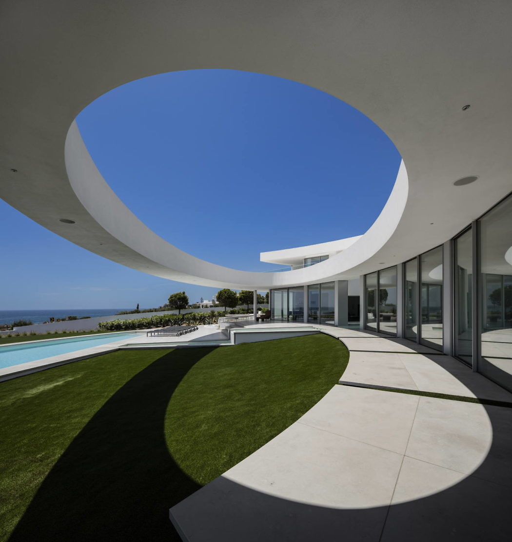Elliptical House by Mario Martins Atelier - Archiscene